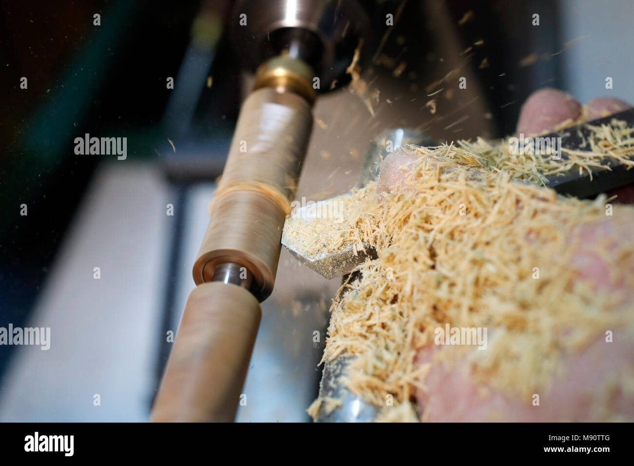 Man working on a wood lathe Stock Photo - Alamy