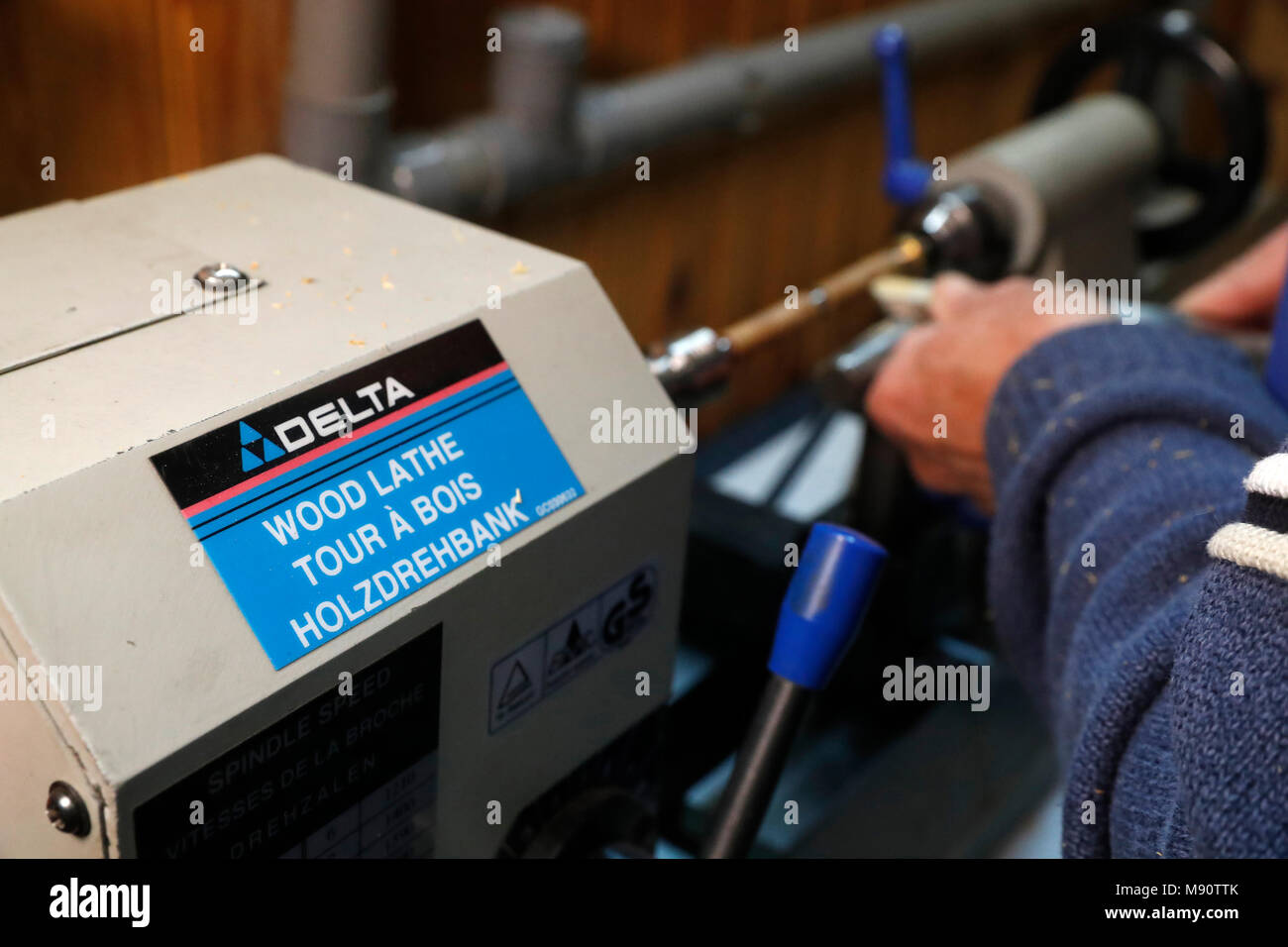 Man working on a wood lathe Stock Photo - Alamy