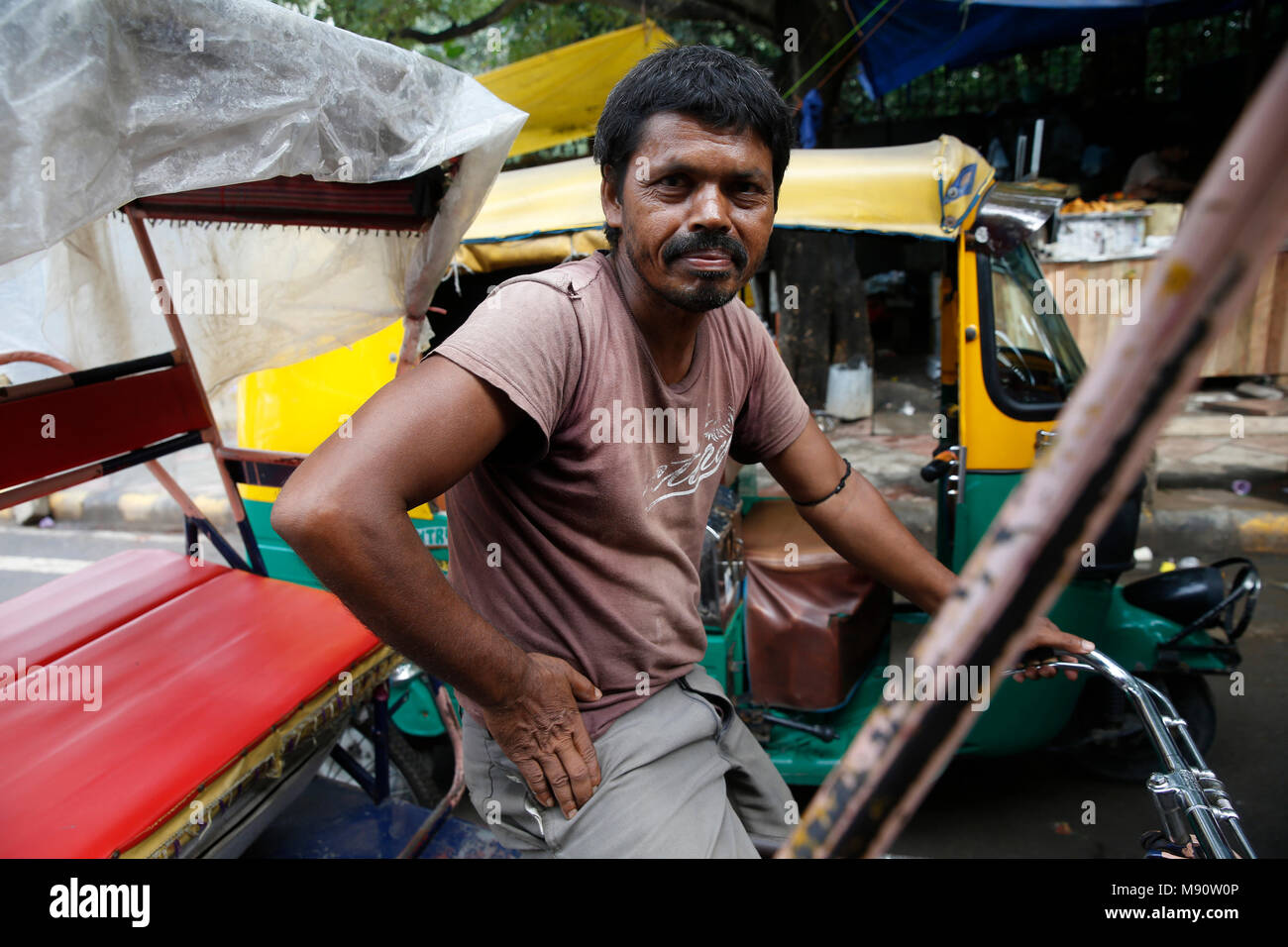 Rickshaw driver in Delhi, India Stock Photo - Alamy