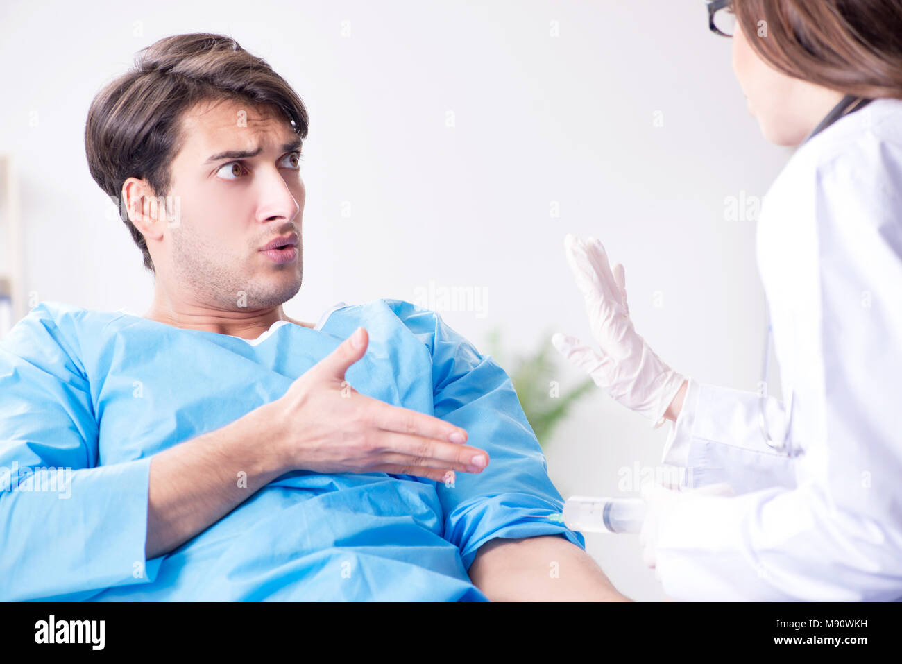 Scared patient man getting hi-res stock photography and images - Alamy
