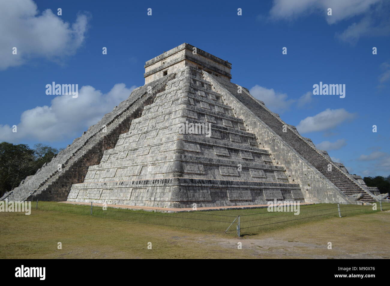 The northeast corner of El Castillo pyramid at Chichen Itza, Mexico ...