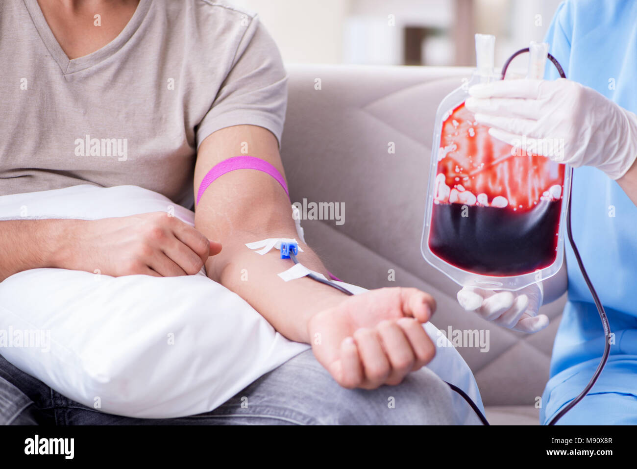 Patient getting blood transfusion in hospital clinic Stock Photo - Alamy