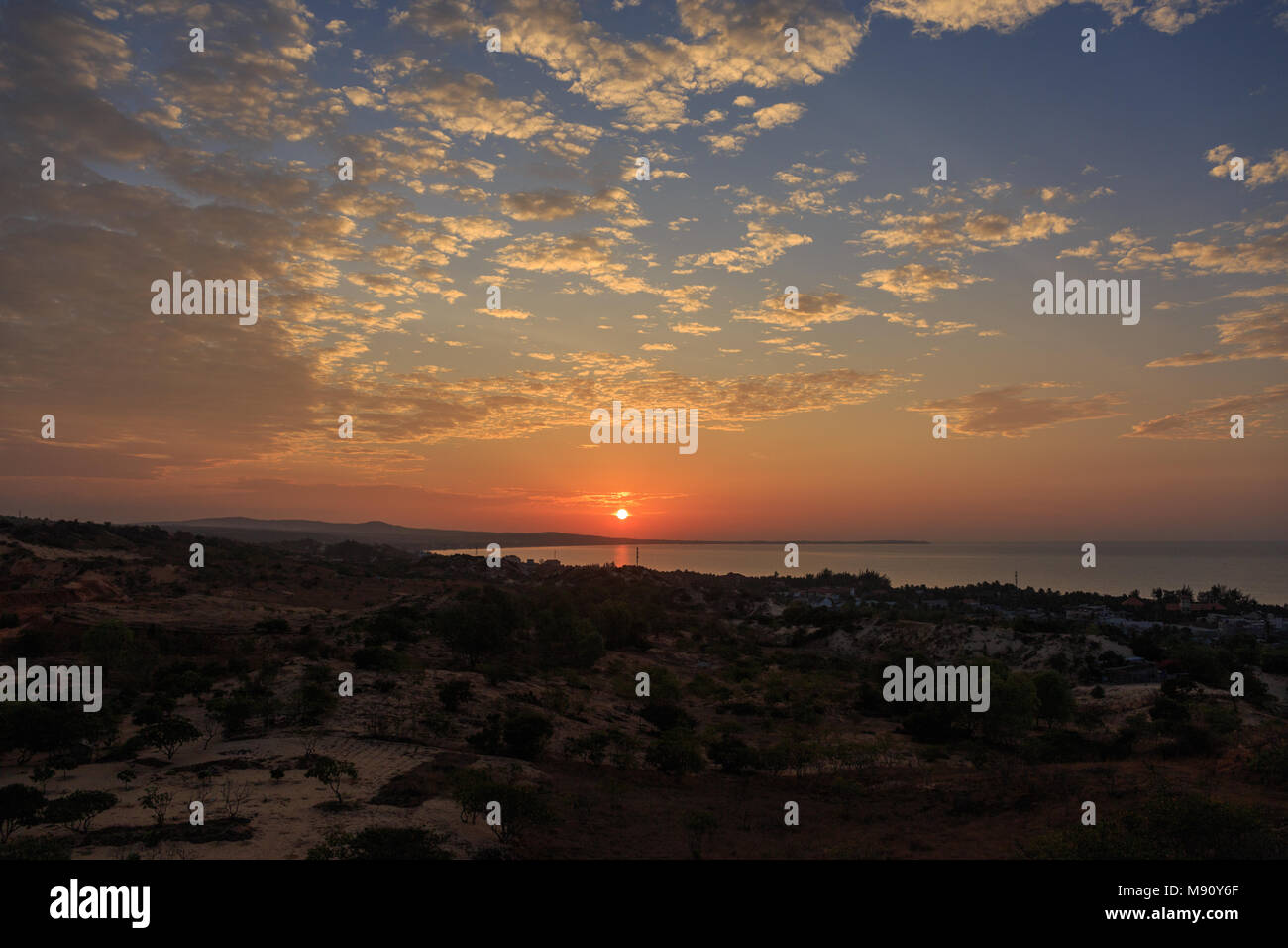 Beautiful sunrise with dramatic cloudscape in Mui Ne, Vietnam Stock ...