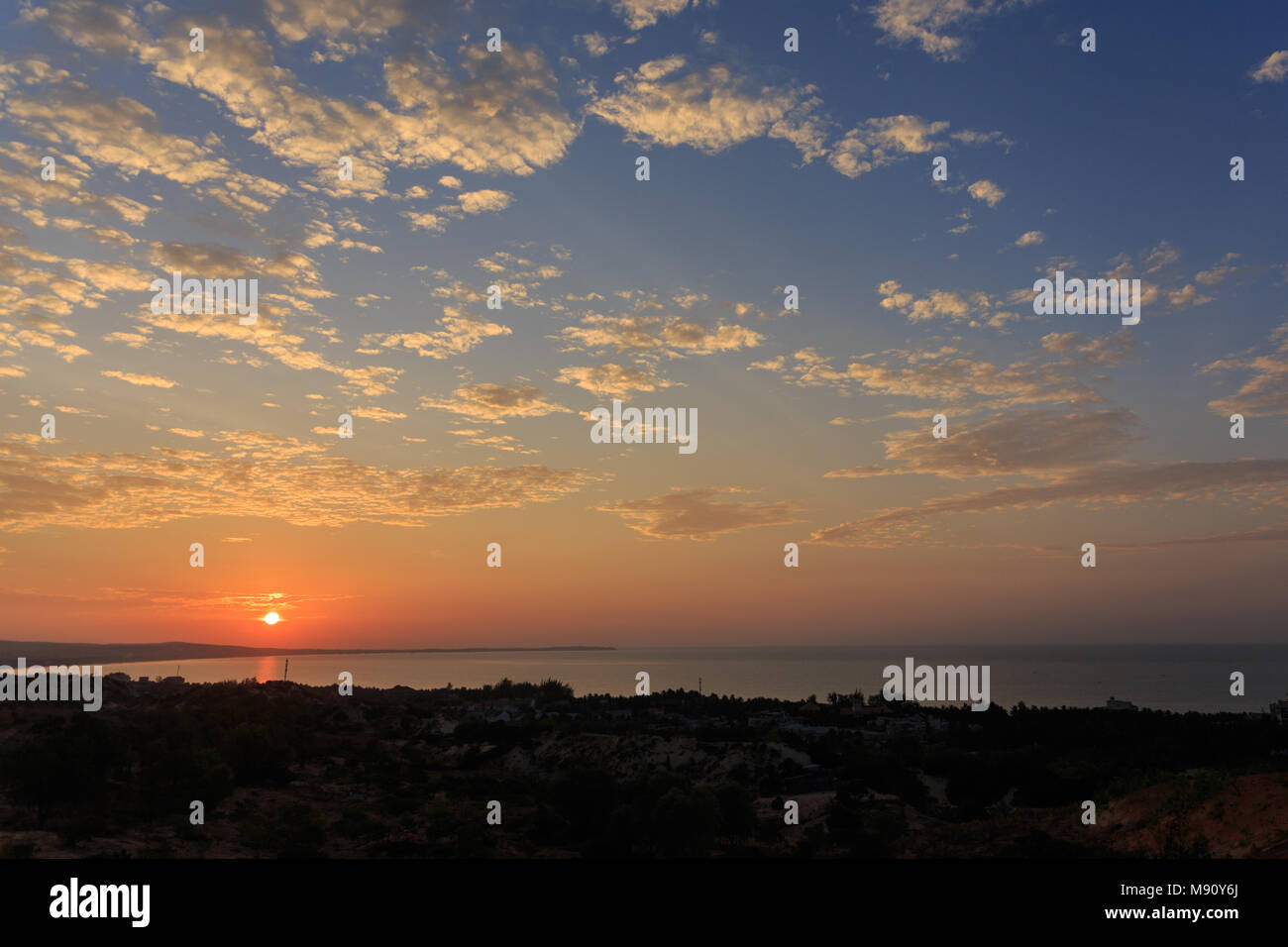 Beautiful sunrise with dramatic cloudscape in Mui Ne, Vietnam Stock ...