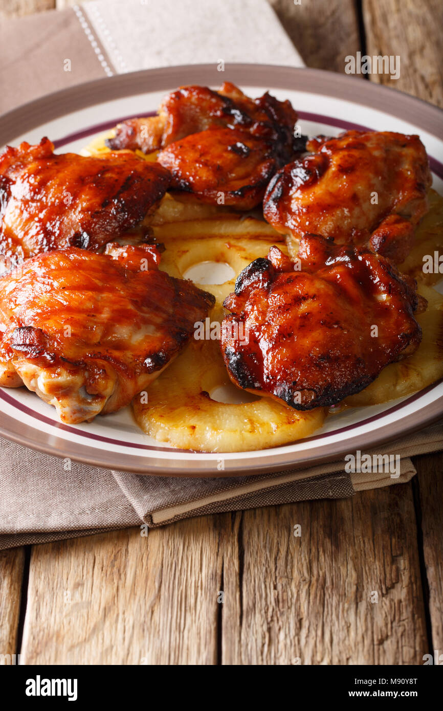 Hawaiian barbecue: chicken huli huli with pineapple close-up on a plate ...