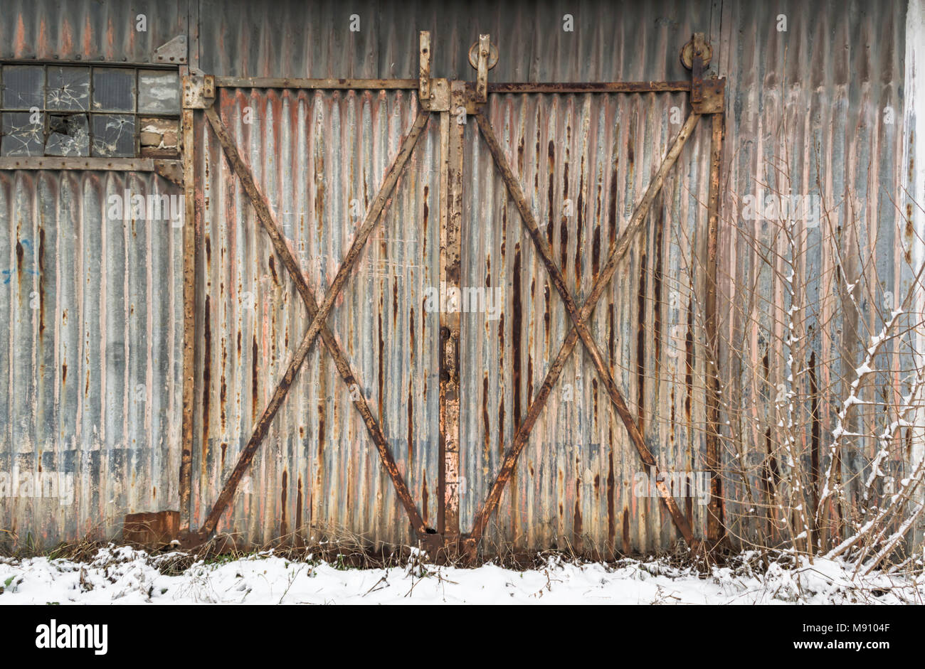 An old rusty industrial metal doors Stock Photo - Alamy