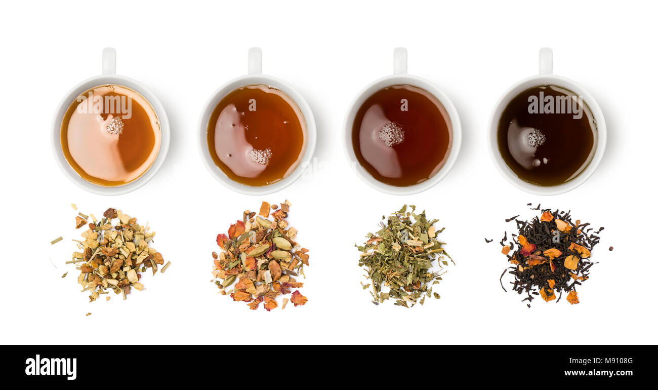 variety of tea blends with relative cups on white background Stock ...