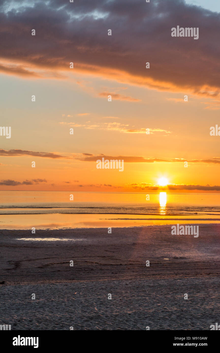 Sand and beach with sunset Stock Photo - Alamy