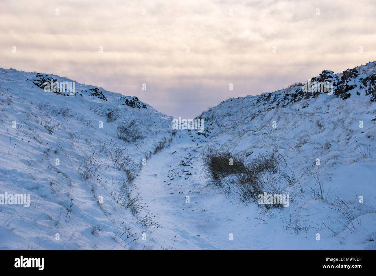 Bridle path in the hills of the Peak District on a freezing cold winter ...