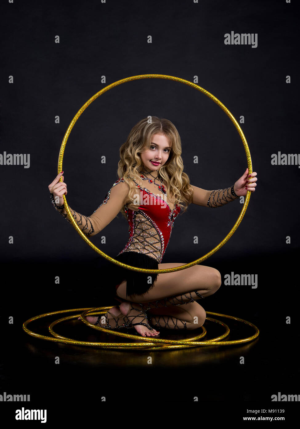 Young Female Contortionist On Dark Stock Photos & Young Female ...