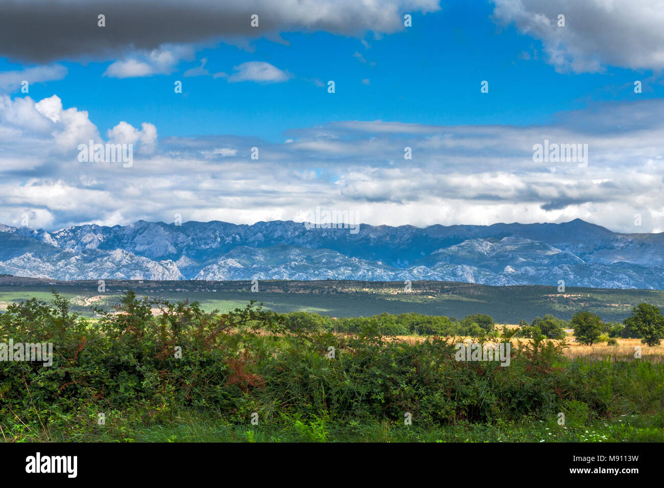 Dinaric Alps mountain range of the Balkan peninsula and its plains seen ...