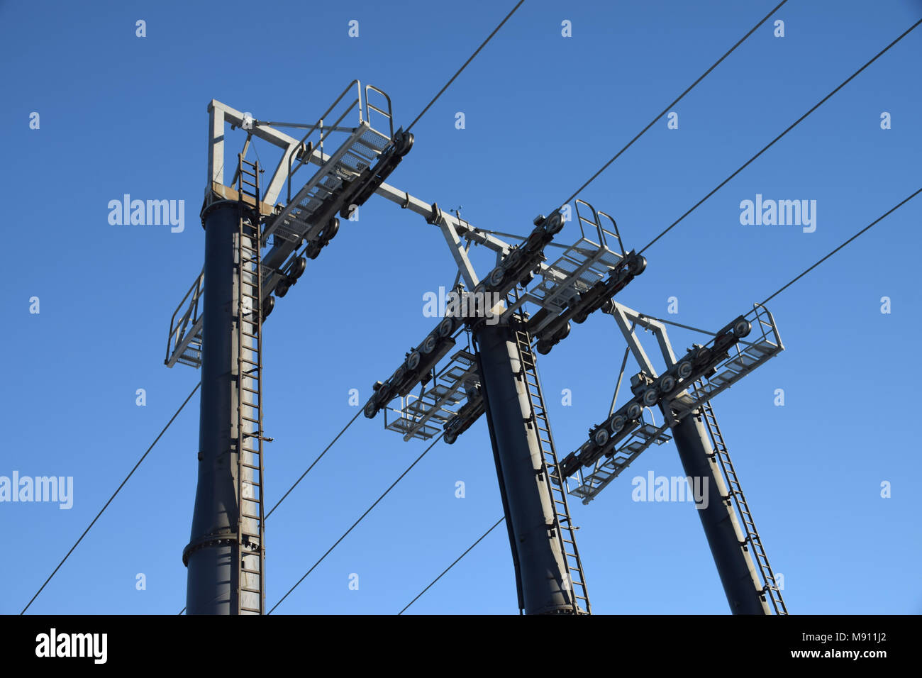 Steel pillars of a mountain cable car Stock Photo - Alamy