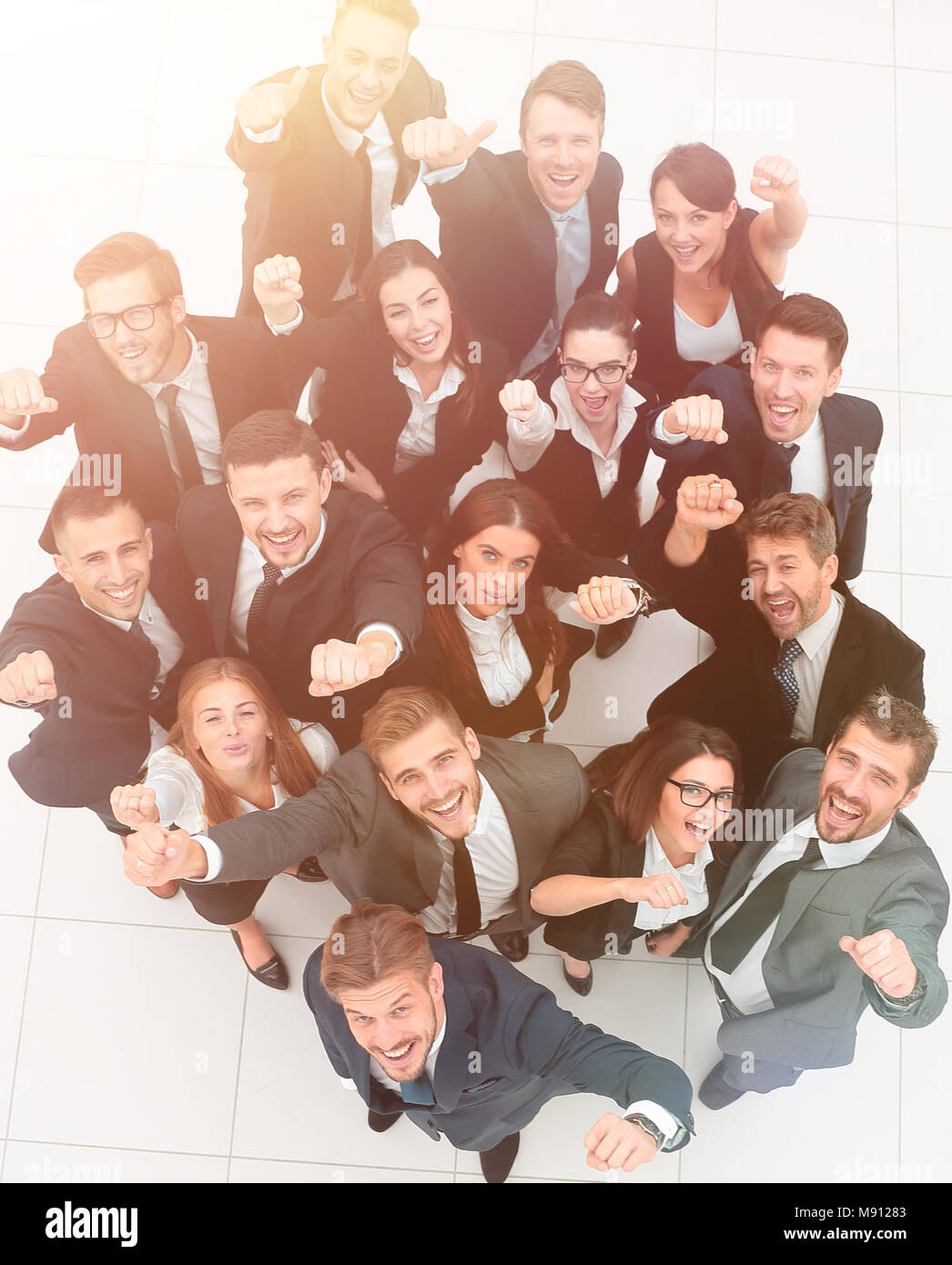 Portrait triumphant business team hi-res stock photography and images ...