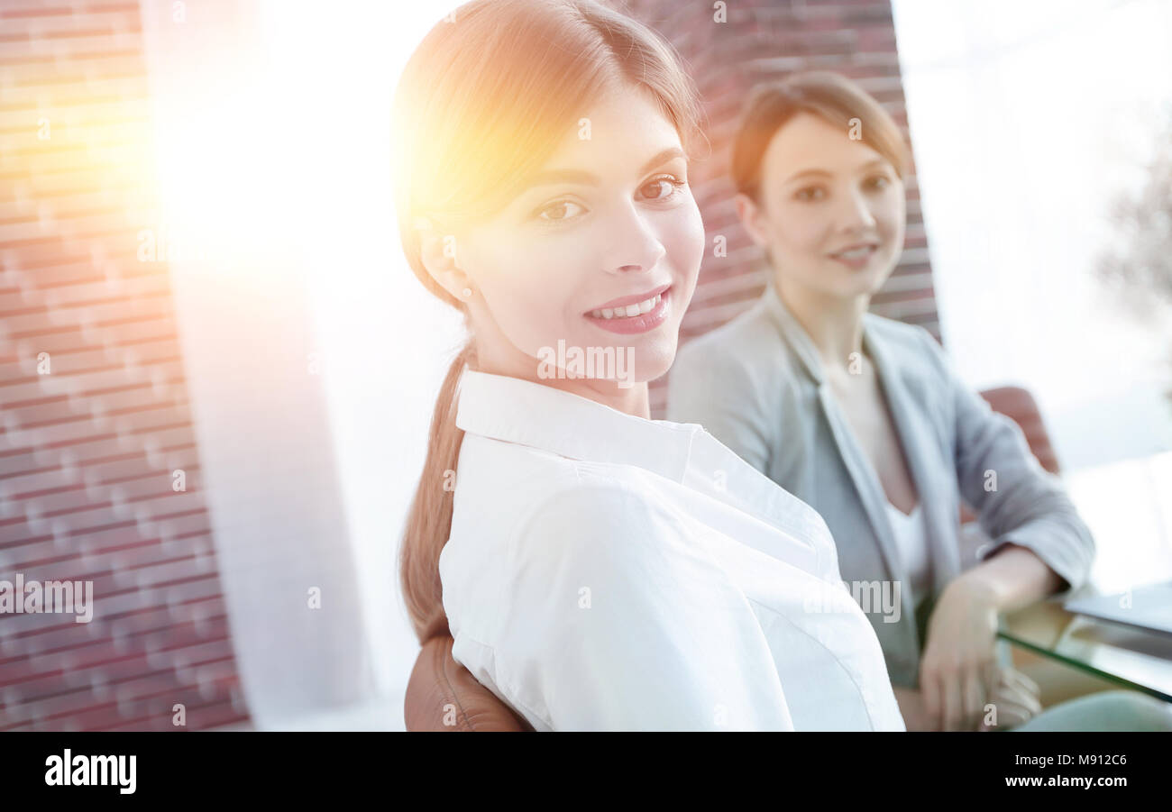 office workers sitting behind a Desk Stock Photo - Alamy