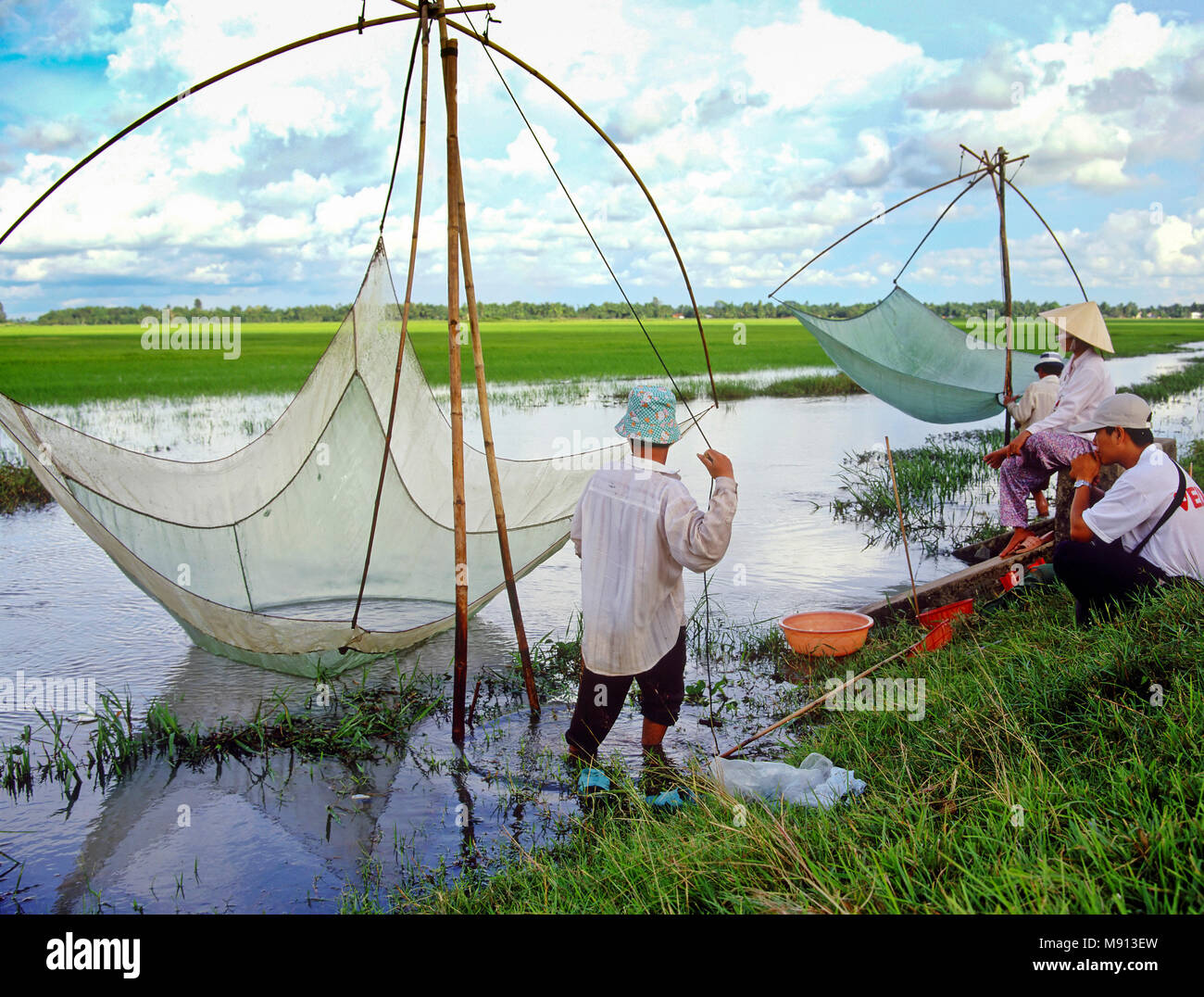 Fishing in rural Vietnam Stock Photo - Alamy