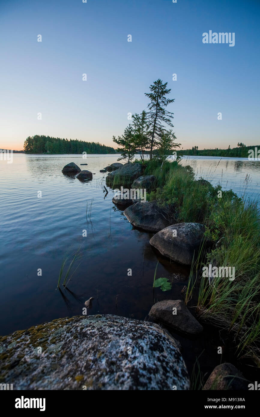 Sunset by lake in Sweden 2016 Stock Photo - Alamy