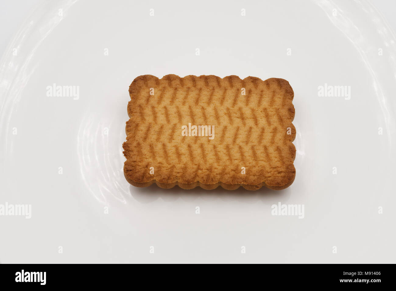 One square biscuits. One square flat biscuits. Close-up Stock Photo - Alamy
