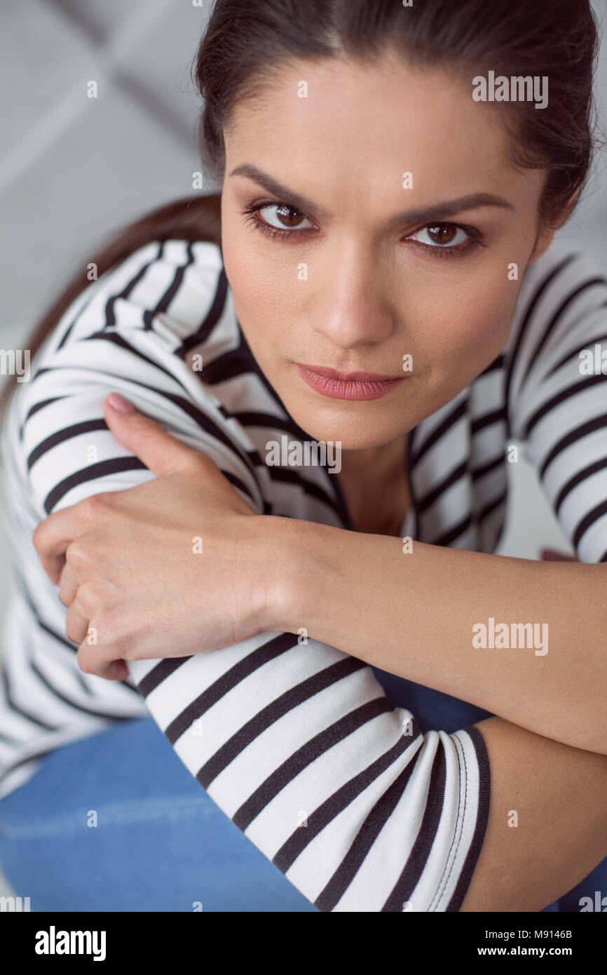 Nice sad woman looking at you Stock Photo - Alamy