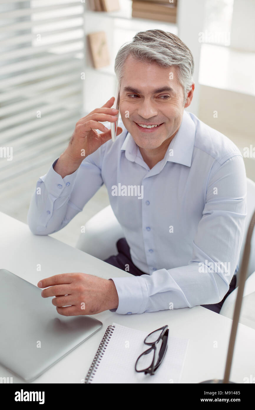 Happy cheerful man smiling Stock Photo - Alamy