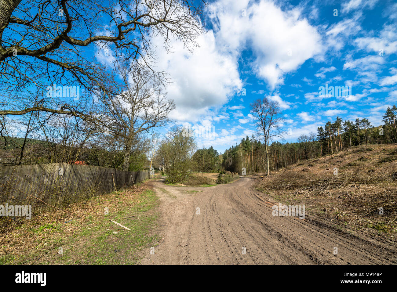 Rural road and wooden fence, spring landscape, countryside scene Stock ...