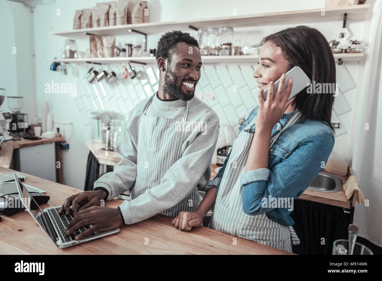 Nice positive people working together Stock Photo - Alamy