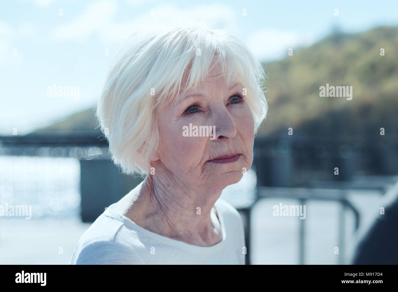 Old woman thinking hi-res stock photography and images - Alamy