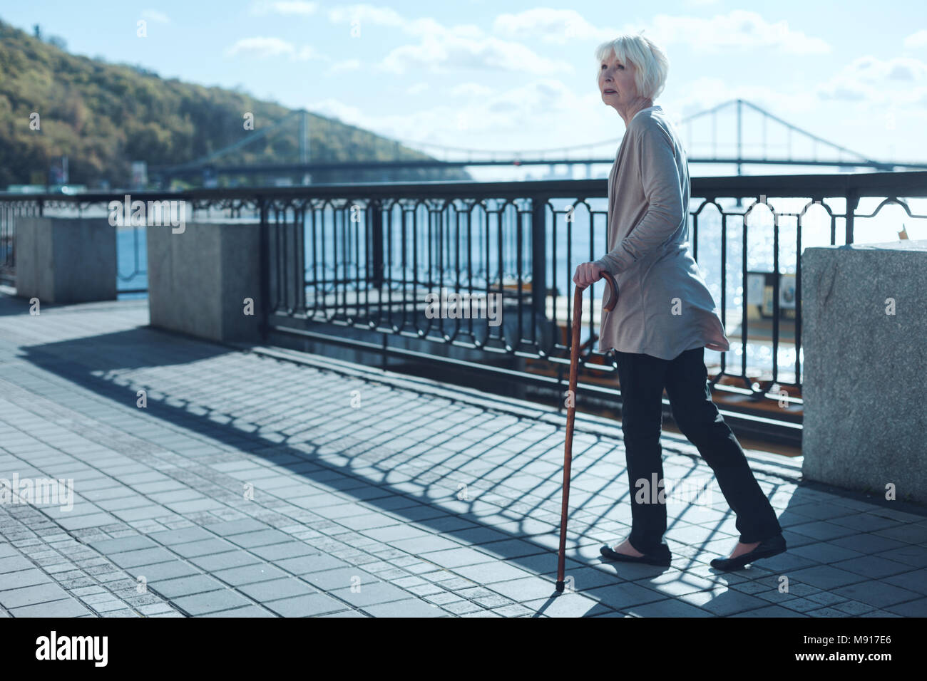 Old woman cane hi-res stock photography and images - Alamy
