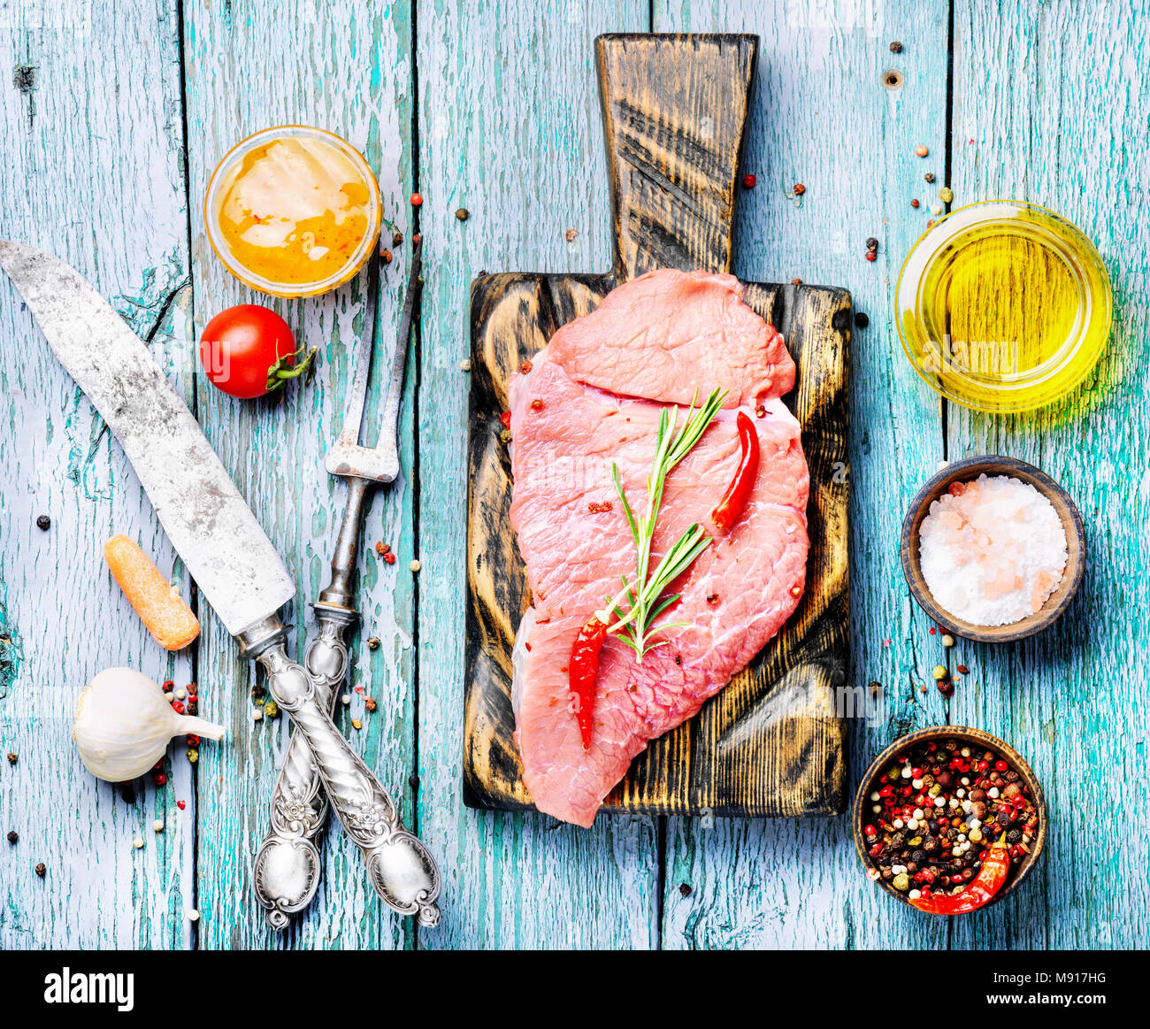 Raw beef fillet steaks with rosemary and spices.Raw meat Stock Photo ...