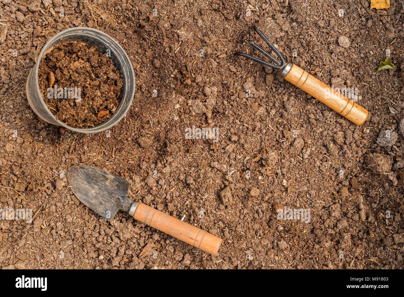 Gardening tools and soil for planting Stock Photo - Alamy