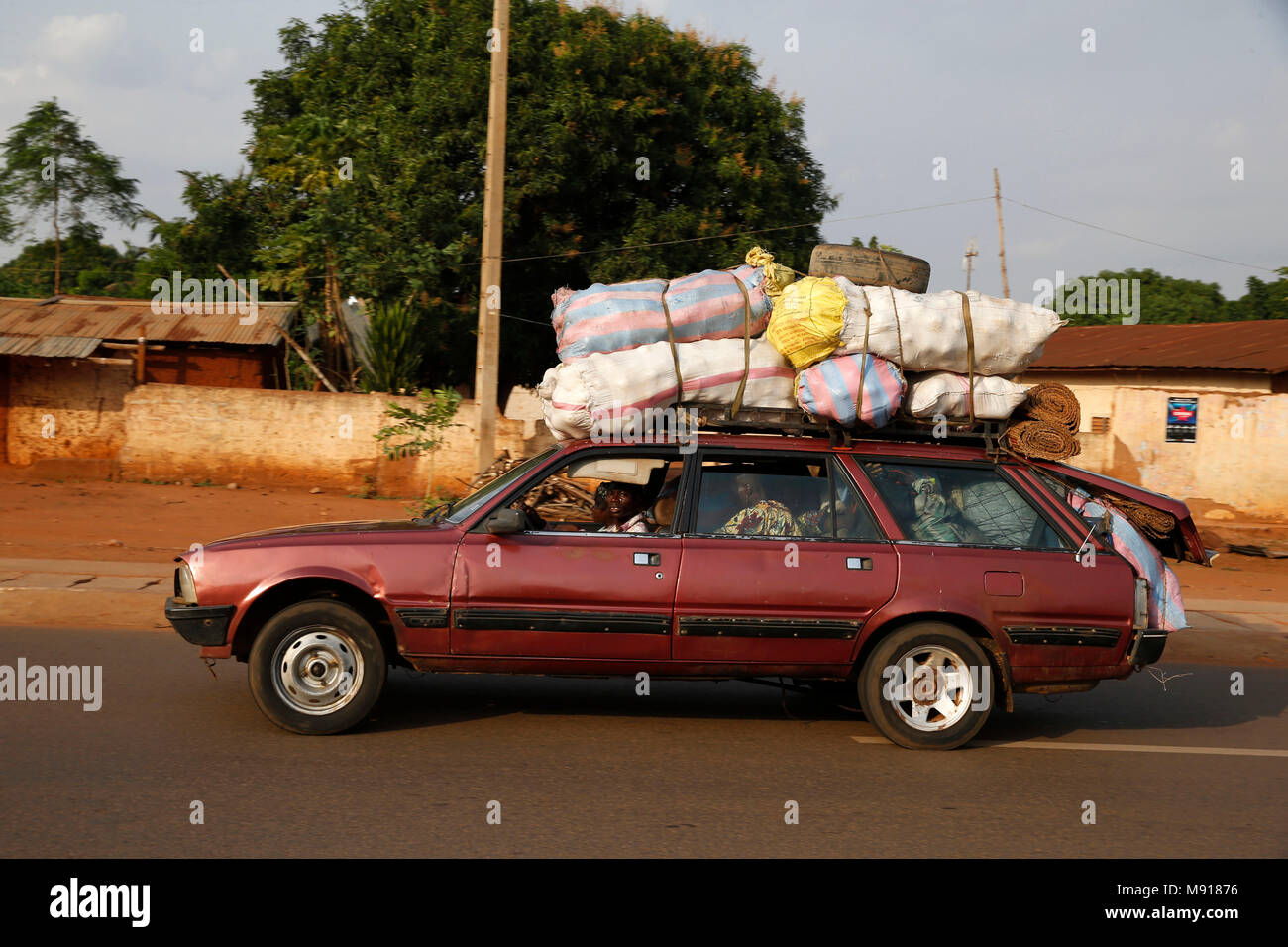 Loaded vehicle in Bohicon, Benin Stock Photo - Alamy