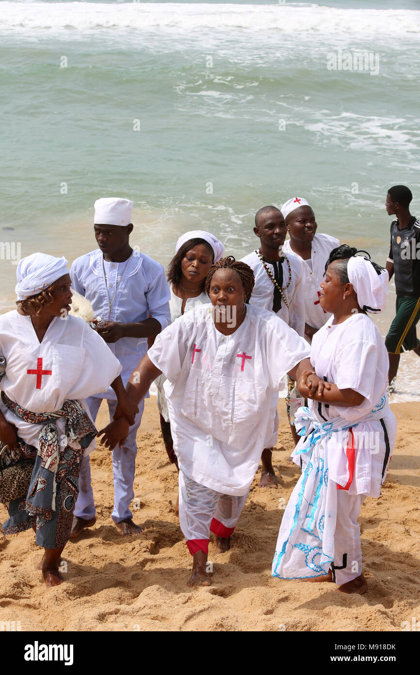Voodoo cult on a beach in Cotonou, Benin. Tranced woman Stock Photo - Alamy