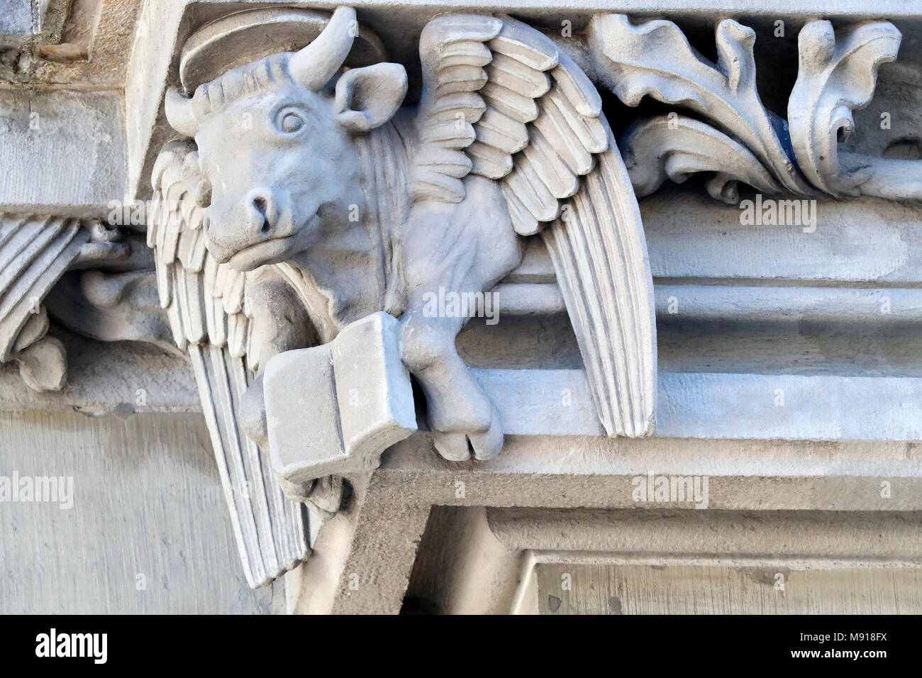 St Nicholas Cathedral. Saint Luke's and The Winged Ox. Statue. Fribourg. Switzerland Stock Photo ...