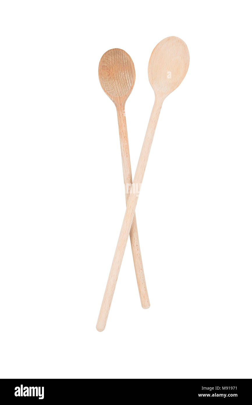 Two wooden long stirring spoons isolated on white background, surface ...