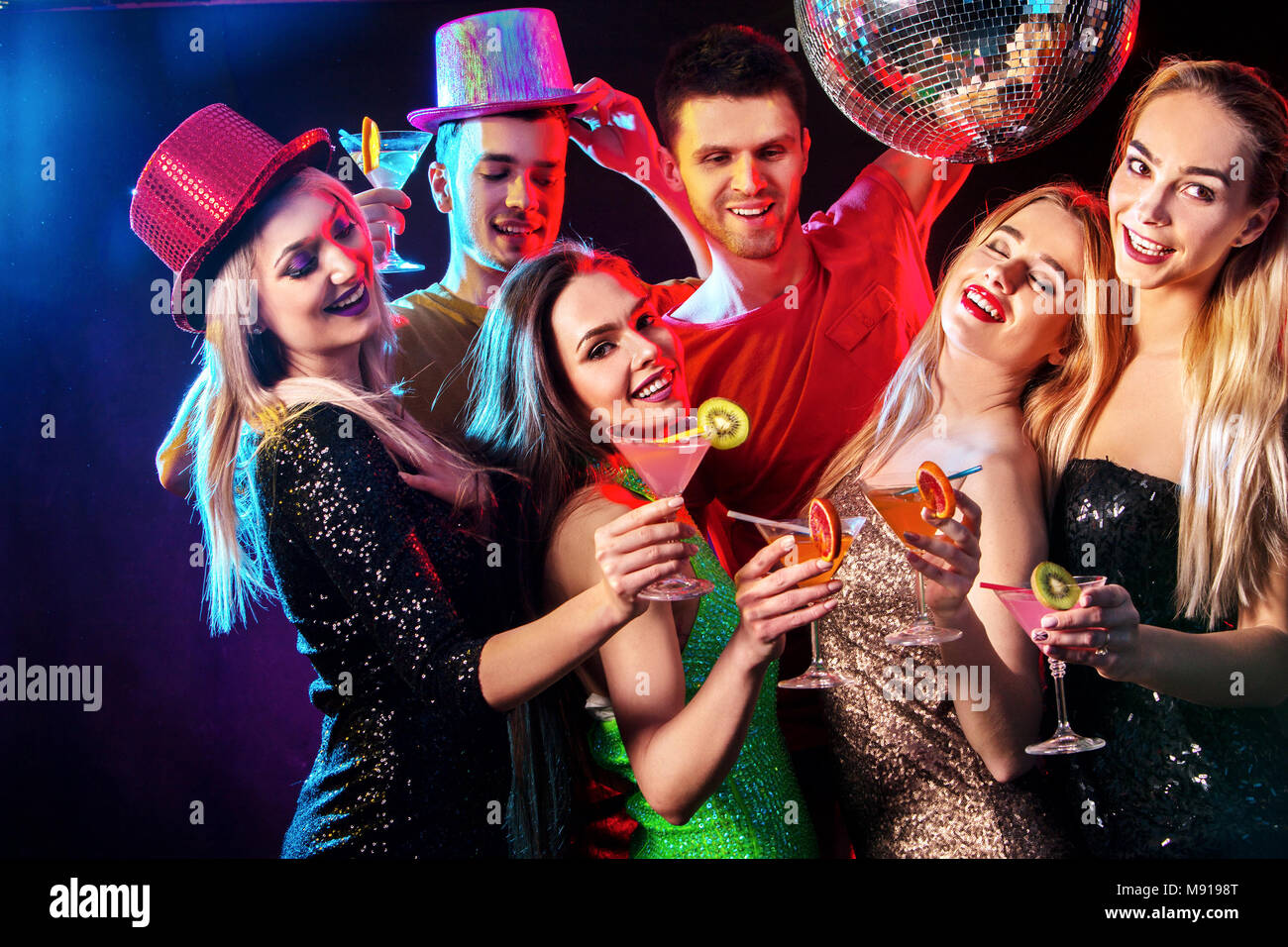 Dance party with group people dancing and disco ball Stock Photo - Alamy