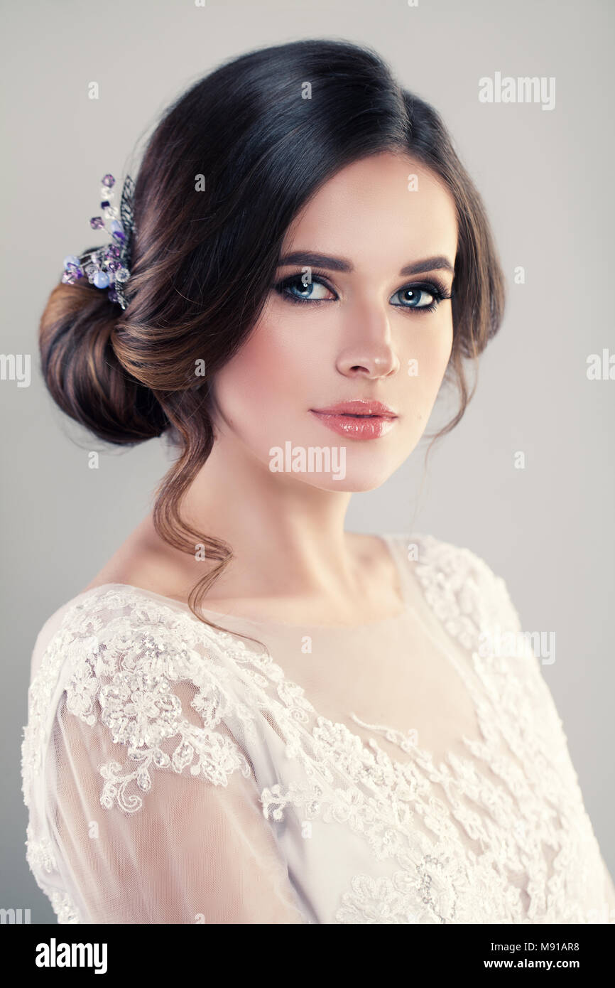 Young Woman Fashion Model With Beautiful Hairstyle And Makeup Stock
