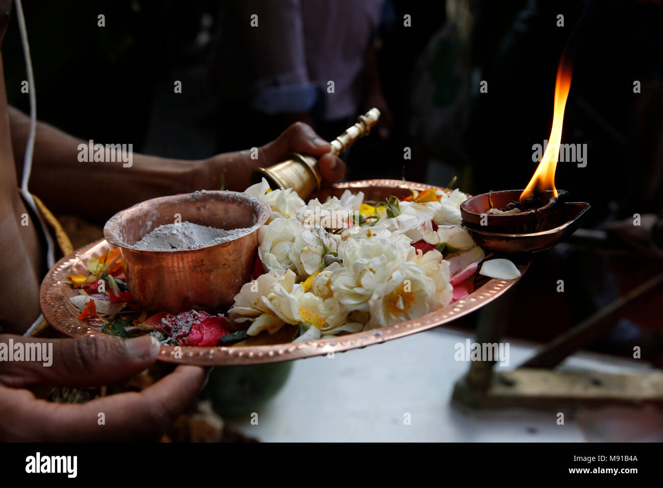Ganesh festival in Paris. Priest with offerings. France Stock Photo - Alamy