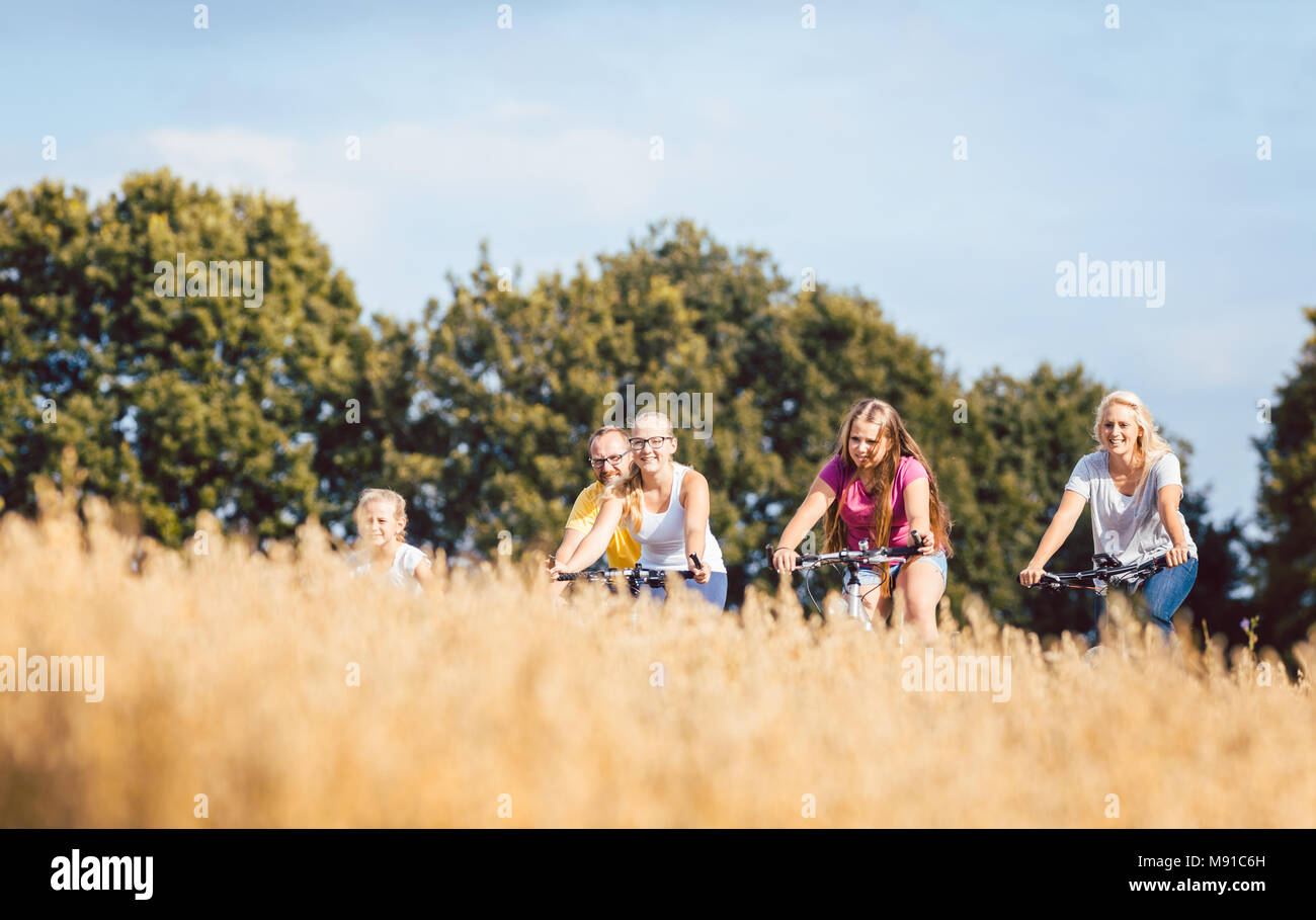 Family riding bikes hi-res stock photography and images - Alamy