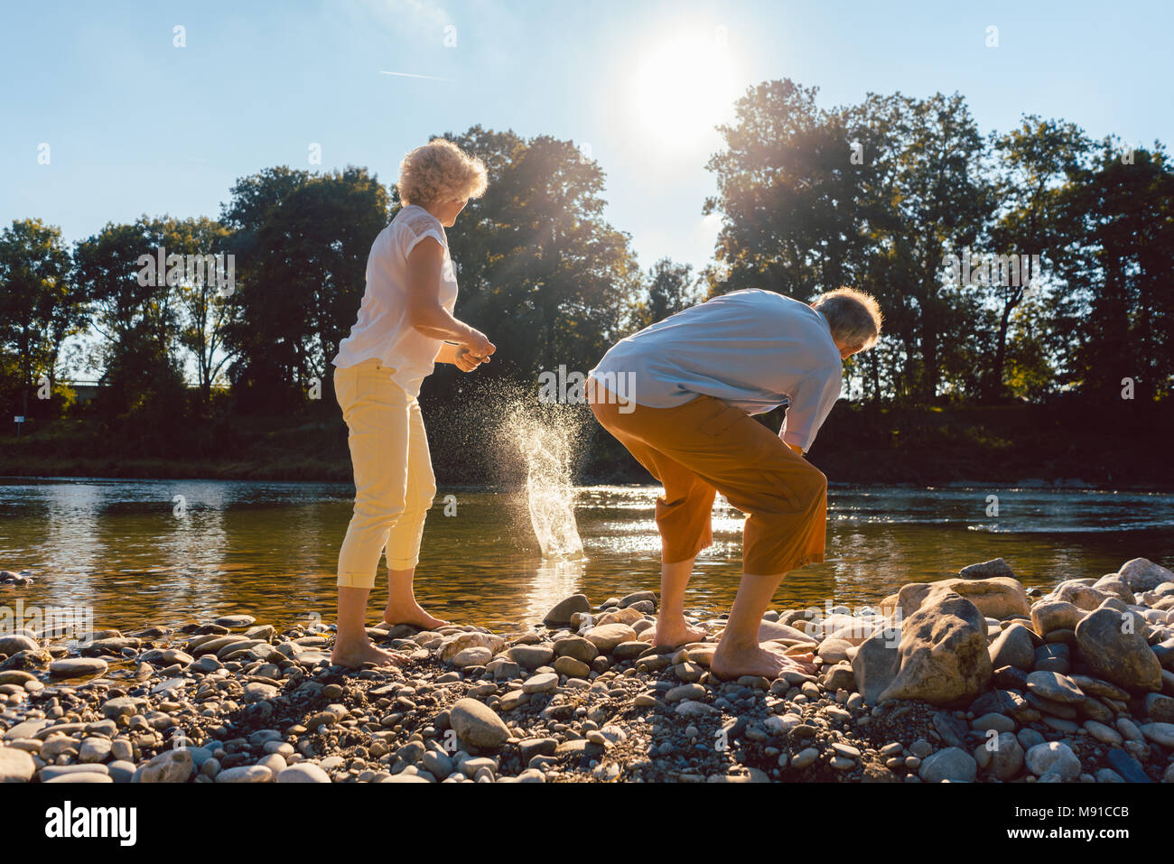 Two senior people enjoying retirement and simplicity Stock Photo - Alamy
