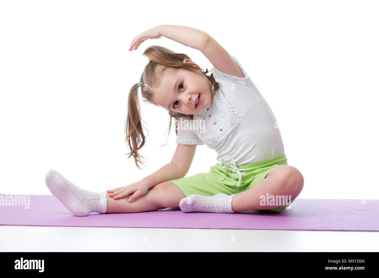 Kid doing fitness exercises Stock Photo - Alamy