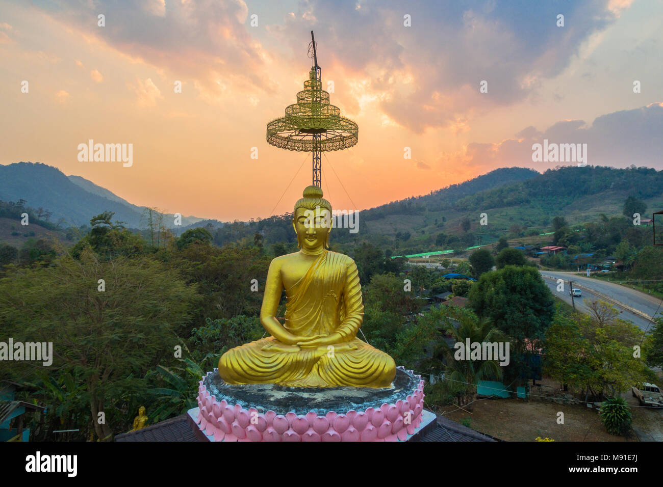 aerial photography the golden buddha statue at wat Sirattanan Mongkol ...
