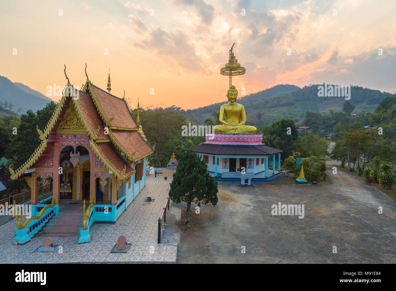 aerial photography the golden buddha statue at wat Sirattanan Mongkol ...