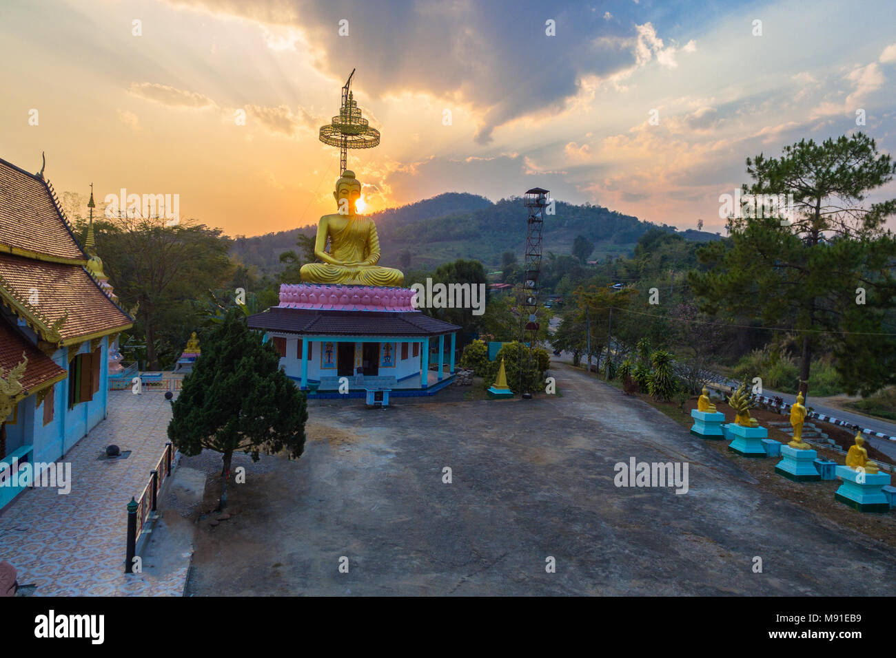aerial photography the golden buddha statue at wat Sirattanan Mongkol ...