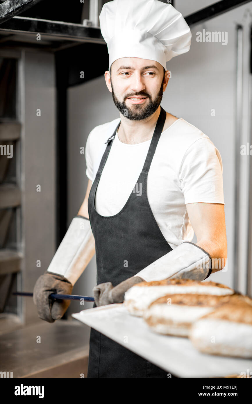 Baked bread factory oven hi-res stock photography and images - Alamy