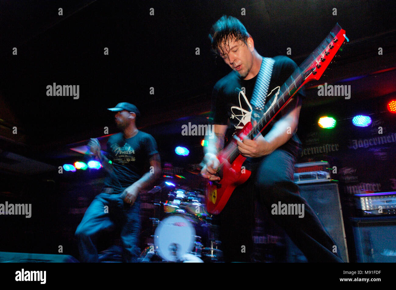 (L-R) Jason Cruz, Jake Kiley of Strung Out performing on the ...