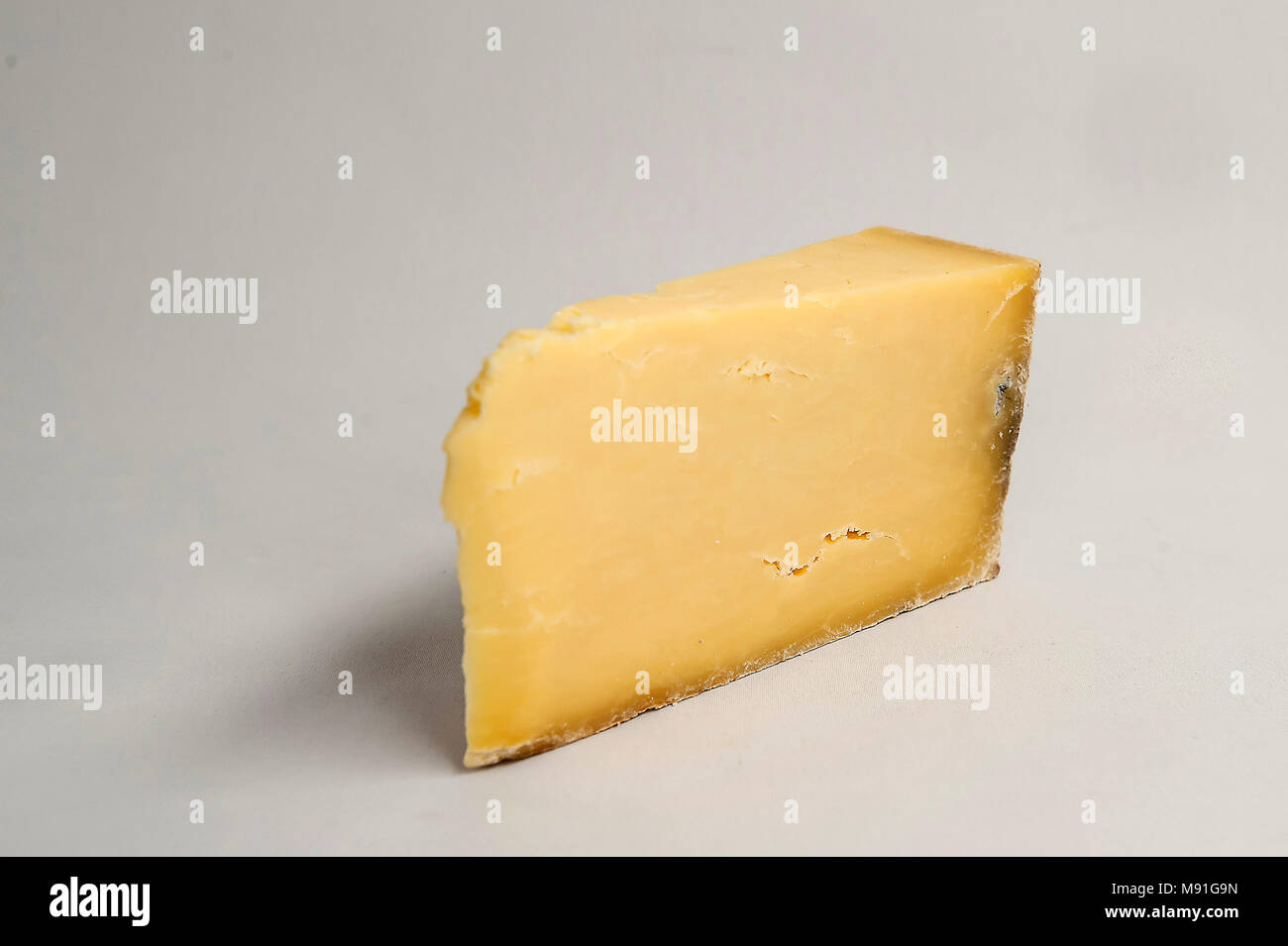 Artisan cheddar cheese white background hi-res stock photography and ...
