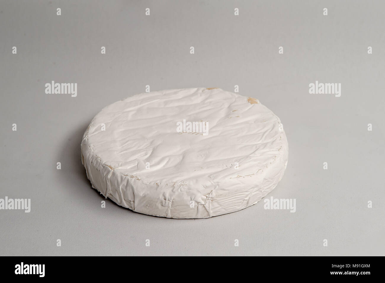 White mould full fat soft cheese hi-res stock photography and images ...