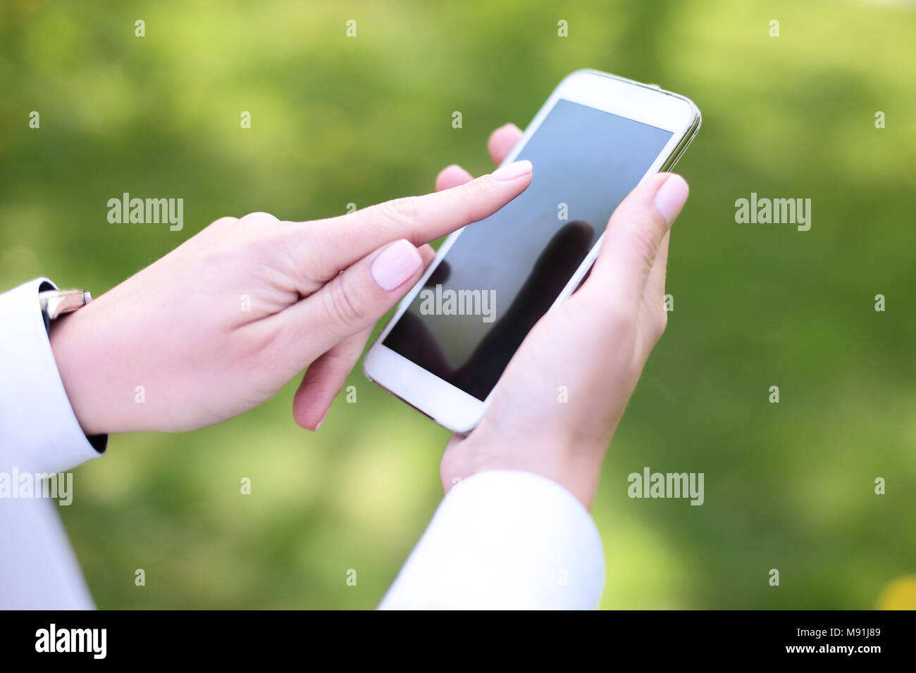 Woman using electronic device hi-res stock photography and images - Alamy