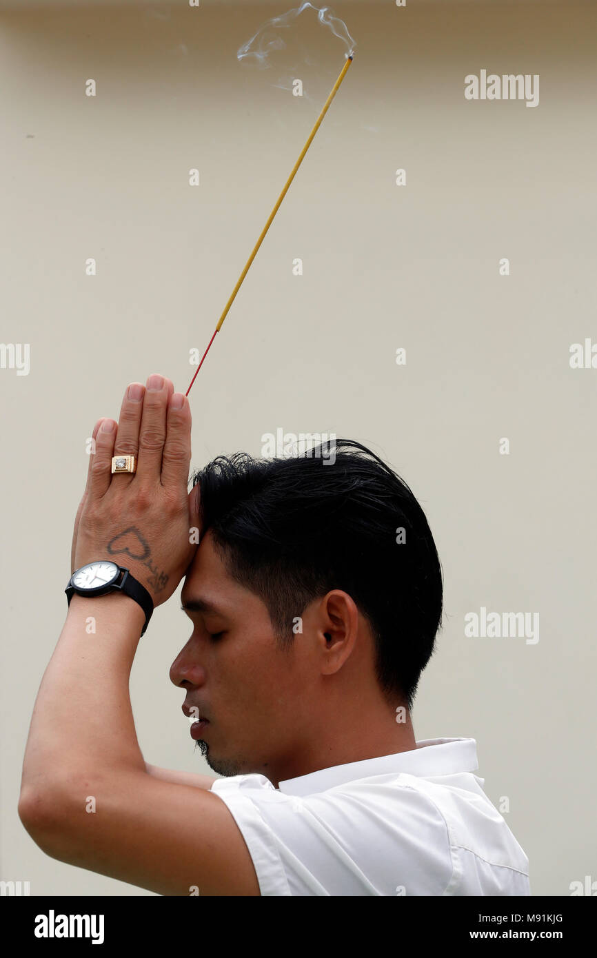 Man holding stick hi-res stock photography and images - Alamy