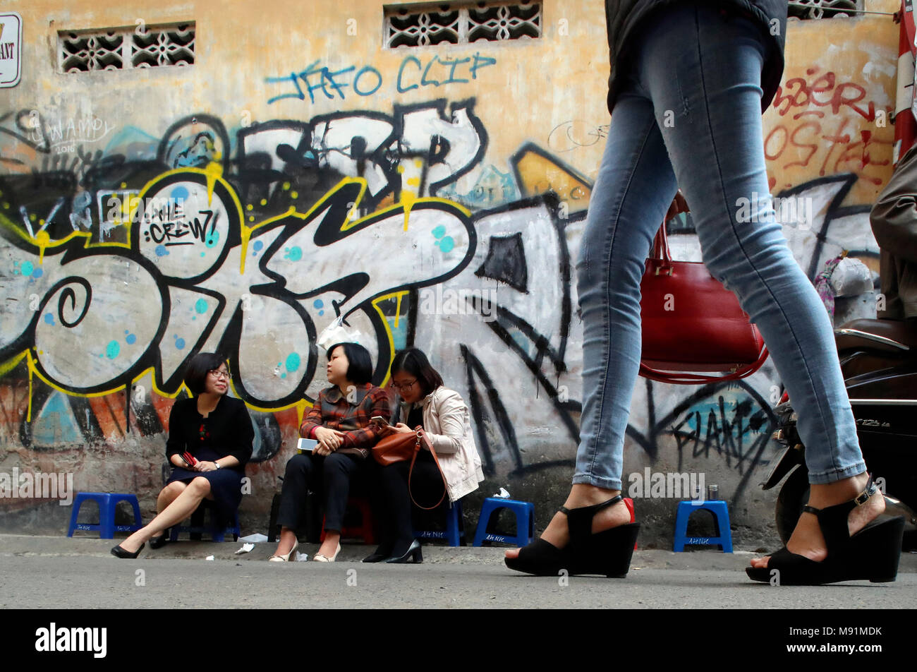 Typical street of the Old Quarter in Hanoi. Graffiti on wall. Vietnam ...