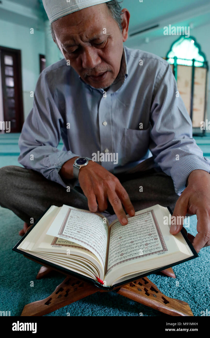 Masjid Al Rahim Mosque. Imam reading the holy Quran. Ho Chi Minh City ...